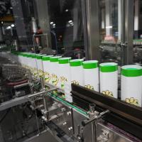 China Automatic Sleeve Labeler Machine 500 BPH 970 Bottles Per Minute for Bottles Cans for sale