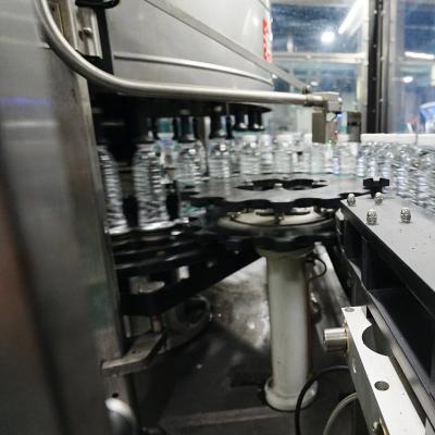 China 28,000 Bph Full Automatic Bottled Water Packaging Line for 100-2000ml Containers with 6000-72000bph Capacity for sale
