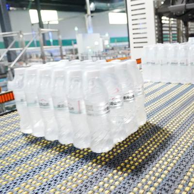 China Full Automatic Electric Driven Gravity Filling Bottle Water Packaging Machine for Plastic Water Bottles for sale