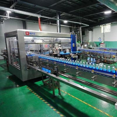 China 32,000 Bph Full Automatic PET Bottled Water Packaging Machine with 6000-72000bph Capacity and 100-2000ml Container Volume for sale
