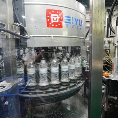 China 8000bph Hot Melt Glue Labeler with Blowing-Labeling-Filling-Capping Combi-Block Series for Customized Automatic Labeling for sale