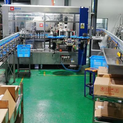 China Automatic Hot Melt Glue Labeler for Glass PET PE PP and Metal Bottles with Customized Labeling Speed for sale
