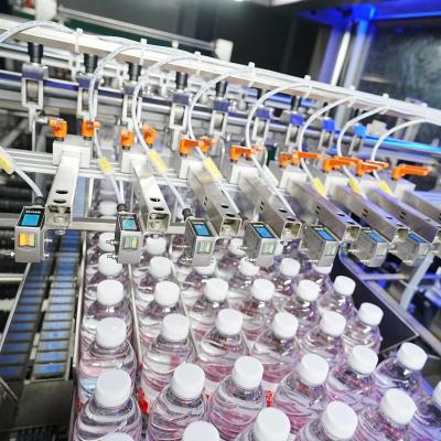 China Full Automatic Heat Shrink Film Packaging Machine with Stainless Steel Heating for 12,000 to 48,000 Bottles/Hour for sale