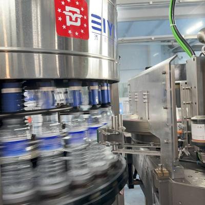 China Automatic Hot Melt Glue Labeling Machine – High-Speed OPP Roll-Fed Labeling Solution for Beverage Bottles  60,000BPH for sale