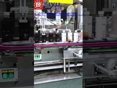 04-11 全自動高速ハンドルラベル機 ラベル付け速度は1時間26,500ボトルに達する