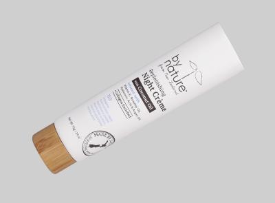China 35-110ml Bamboo Tube Packaging Empty Custom Moisturize Lotion Cosmetic Plastic Tube With Wood Cover for sale