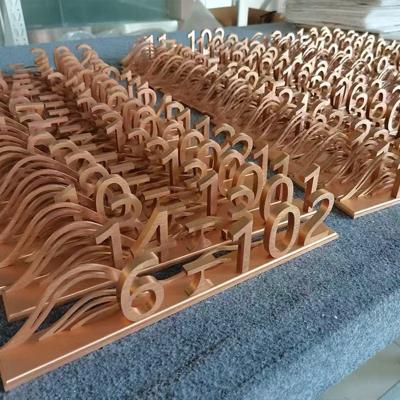 China Custom Sizes Elegant Freestanding Metal Letters for Luxury Hotel Doorplate Signs for sale
