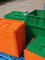 China Supermarket Orange Plastic PP Vented Vegetable Fruit Storage Container Stackable Basket for sale