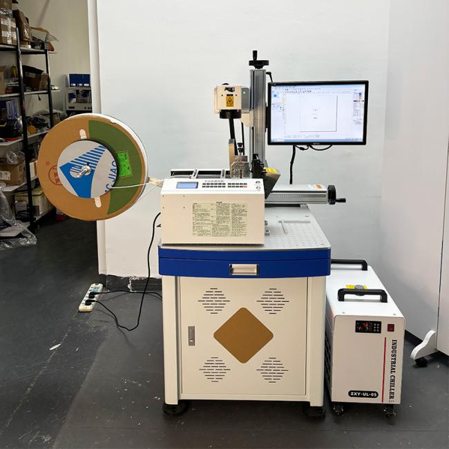 Laser online tube engraving and marking machine in operation
