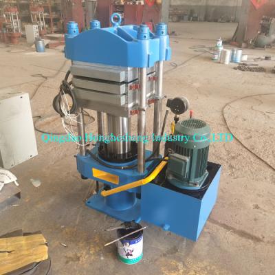 Cina 100T Ring Vulcanizing Machine di gomma 50 tonnellate del piatto di vulcanizzatore di gomma del riscaldamento in vendita