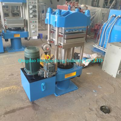 Cina 100T Ring Vulcanizing Machine di gomma 50 tonnellate del piatto di vulcanizzatore di gomma del riscaldamento in vendita
