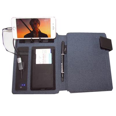 Cina La vendita all'ingrosso ha personalizzato il taccuino astuto di carico senza fili di Powerbank della copertina dura di lusso di cuoio premio dell'unità di elaborazione in vendita