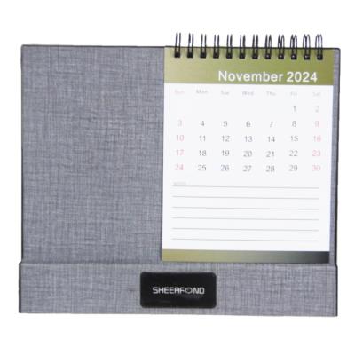 Cina New Design 2024 Quality Customized Art Logo Pu Leather  Funny  365 Day Wireless Charger Calendar in vendita