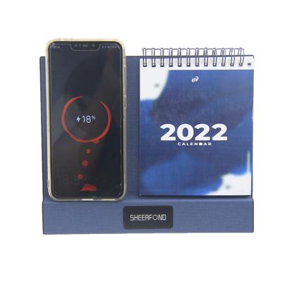 China Calendario di carico senza fili di cuoio multiuso impermeabile con il supporto del telefono for sale