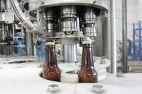 China Easy Operation Automatic Beer Filling Machine For Washing Bottle for sale