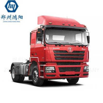 China Cabeza de remolque Shacman 6×4 rueda motriz camión tractor de carga pesada para el transporte de piedra en venta