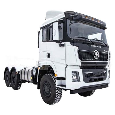 China Shacman Traktor-Lkw mit 351-450 PS 31-40 Tonnen Kapazität Druckbeständigkeit Verdickte Kabine Stahlplatte zu verkaufen