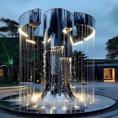 China Mirror Polished Stainless Steel Hand Forged Waterfall Column Sculpture With Mascot Theme for sale