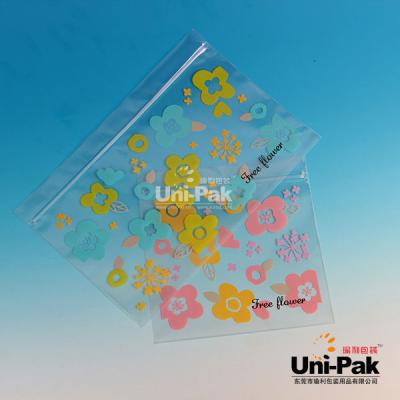 China Colorful Printing Garment Packaging Bags With Ziplock Three Side Sealed for sale