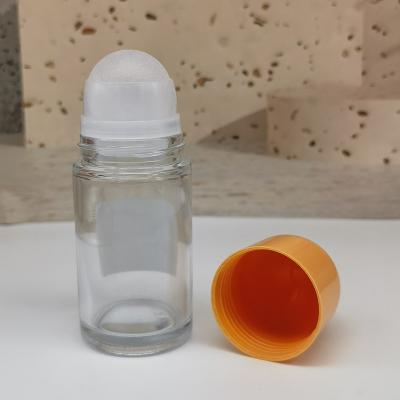 Cina Empty Clear Deodorant Stick Container Thick Glass Roller Ball Essential Oil Bottle 50ml in vendita