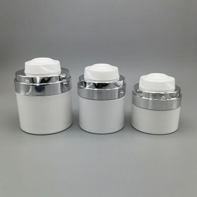 Cina 15ml 30ml 50ml Refillable Acrylic Cosmetic Airless Pump Jar With Rose Shape Pump in vendita