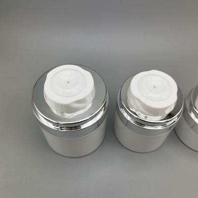 Cina 15ml 30ml 50ml Refillable Acrylic Cosmetic Airless Pump Jar With Rose Shape Pump in vendita