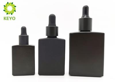 Cina bottiglie di vetro opache del contagoccia del quadrato nero di 15ml 30ml 50ml per olio essenziale in vendita