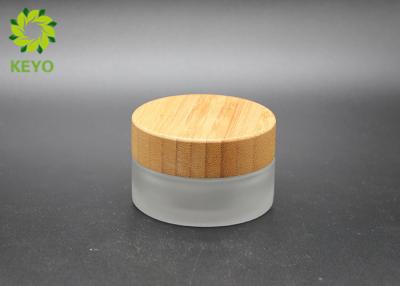 中国 タケふたが付いているクリームのためのコンパクトの曇らされたガラスの化粧品のびんそして瓶 販売のため