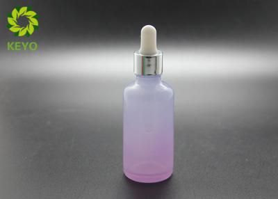 中国 銀製アルミニウム点滴器が付いている曇らされた勾配色の空の化粧品のびん 販売のため