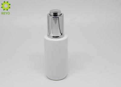 Cina mini bottiglie di olio essenziale di vetro rotonde bianche 1OZ con il contagoccia d'argento del pulsante in vendita