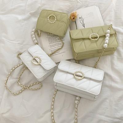 China Crossbody bag female summer 2022 new trendy fashion rhombus chain bag shoulder small square bag for sale