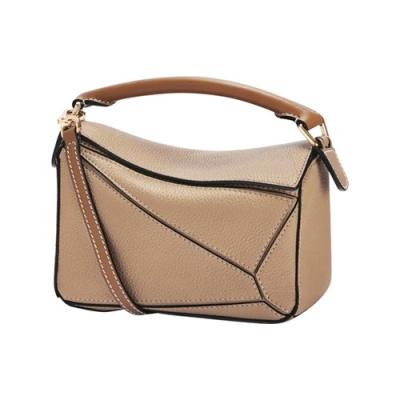 China New geometric bag women's leather hand-held one-shoulder diagonal pillow bag for sale