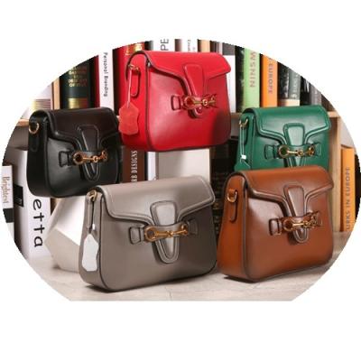 China Horseshoe buckle bag retro cowhide canvas one shoulder diagonal saddle bag genuine leather for sale