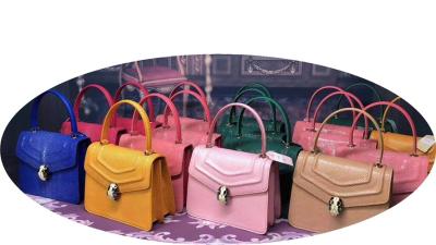 China Pearl Fish Skin Women's Bag Leather Portable Organ Bag Women's 2022 New Trendy Luxury All-Match Shoulder Messenger Bag for sale