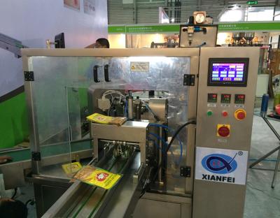 Cina 300mm rotante imballaggio macchina 1500g completamente automatico stand up sacchetto imballaggio macchina in vendita