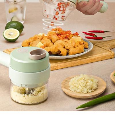 Cina Europe Portable 4 in 1 Vegetable Cutter Set Smart Gadget Slicer elettrico Chopper da cucina in vendita