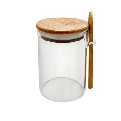 Cina Cibo Bottine rotonde di vetro di bambù con coperchio e cucchiaio Caramelle Spezie Caffè Fagioli Noci Biscotti in vendita