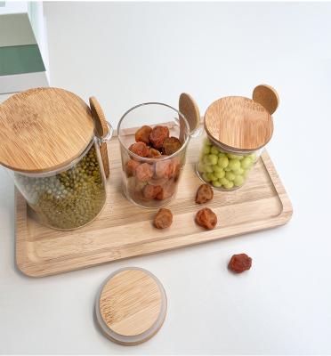 Cina Cibo Bottine rotonde di vetro di bambù con coperchio e cucchiaio Caramelle Spezie Caffè Fagioli Noci Biscotti in vendita