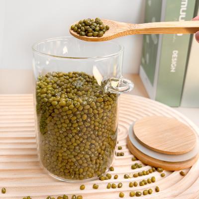 Cina Cibo Bottine rotonde di vetro di bambù con coperchio e cucchiaio Caramelle Spezie Caffè Fagioli Noci Biscotti in vendita