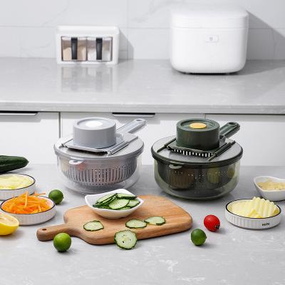 China 12 in 1 Multifunctional Manual Vegetable Cutter Slicer for Green Vegetables and Fruits for sale