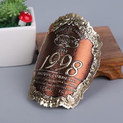 China Custom perfume label sticker metal embossed label for glass bottle brass shield shape custom your message words date age for sale