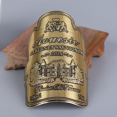 China DOYEN Antique brass Custom Aluminum Embossed Bottle Label metal logo wine stickers Wedding Milestone Wine Labels for sale