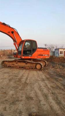 China Doosan DX225LC graafmachine in goede staat 4522 uur werk ORIGINALE hydraulische klep Te koop