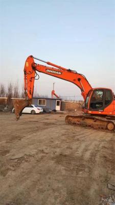 China Doosan DX225LC graafmachine in goede staat 4522 uur werk ORIGINALE hydraulische klep Te koop