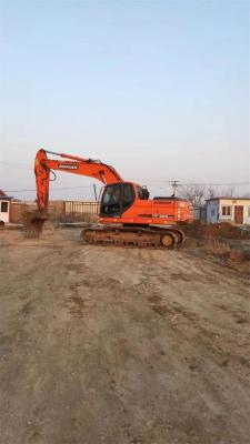 China Doosan DX225LC graafmachine in goede staat 4522 uur werk ORIGINALE hydraulische klep Te koop
