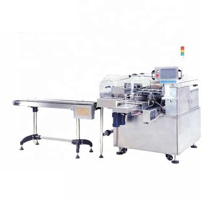 China Automatic Food Mask Box Packing Film Wrapping Machine Wrapping Machine for sale