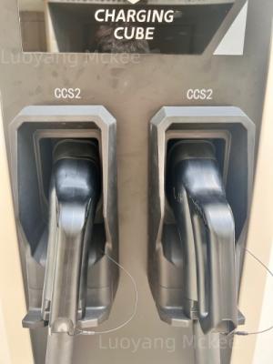 China Algumas peças da nossa estação de carregamento de veículos elétricos oficina moderna 120KW integrada com dupla arma DC estação de carregamento de veículos elétricos CCS2 GBT pilha de carregamento rápido de veículos elétricos comerciais à venda