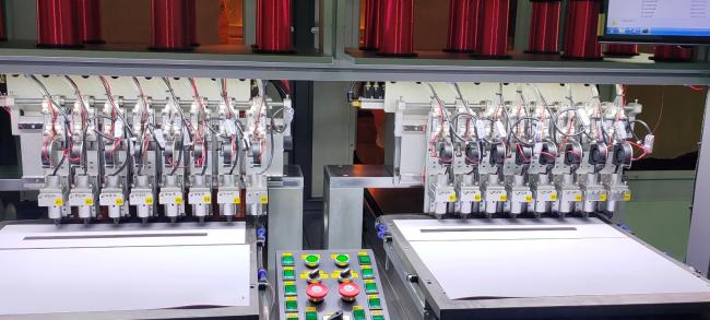 Close-up of Prelam Sheet Antenna Implanter Machine