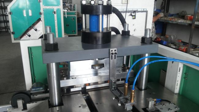 Close-up view of the punching mechanism