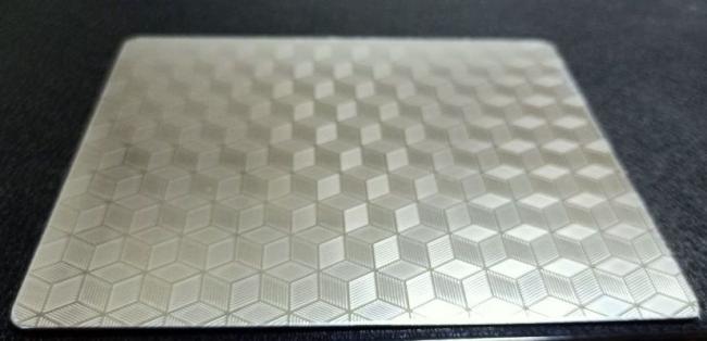 Patterned steel plate showing protective film